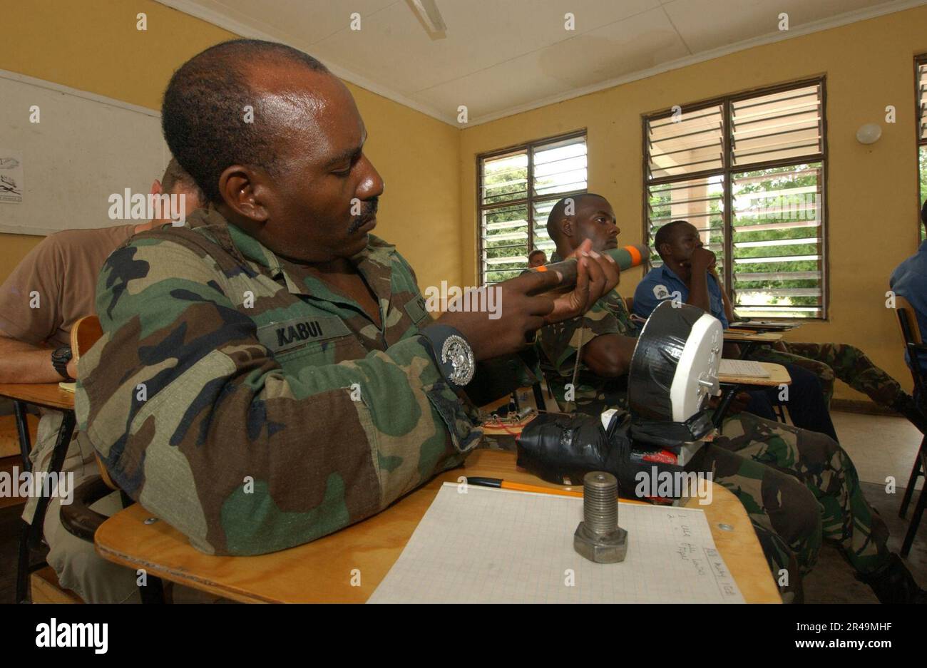 US Navy A member assigned to Kenyan Consolidated Dive Unit (CDU ...