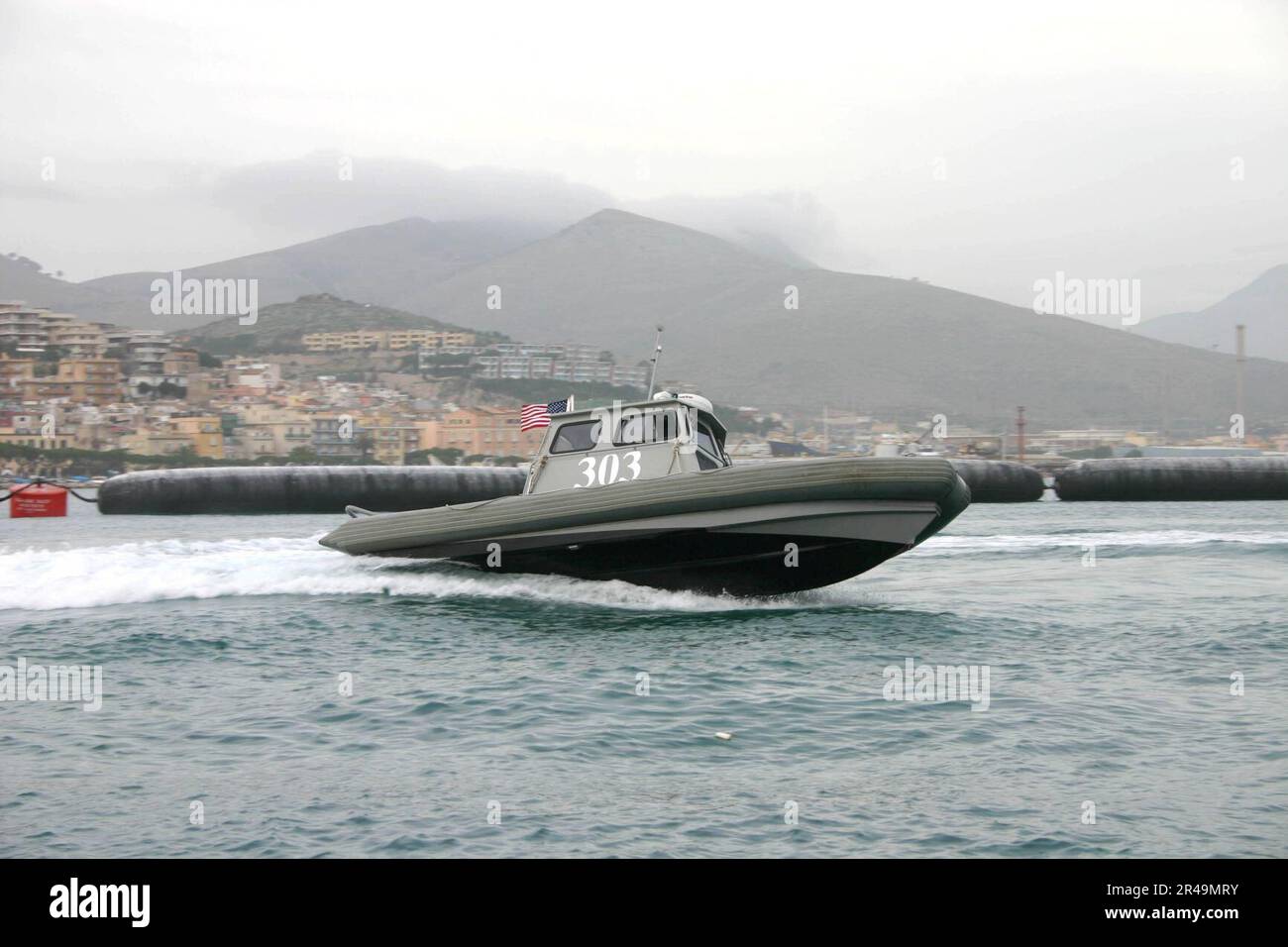 US Navy Sailors aboard a Naval Support Activity's (NSA) Harbor Patrol ...