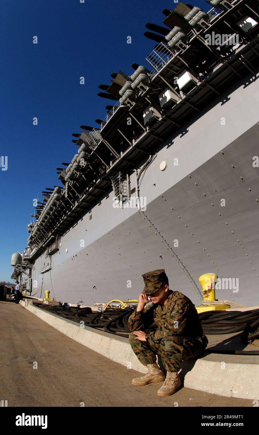 US Navy Lcpl. of Chicago, Ill says a final goodbye to his family on his ...