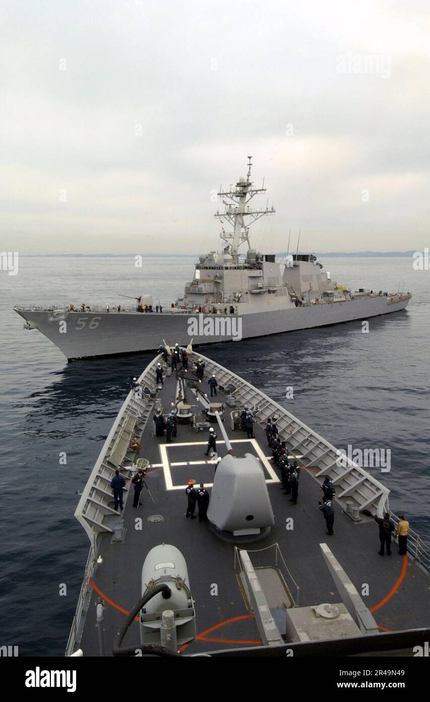 US Navy The guided missile destroyer USS John S. McCain (DDG 56) closes ...