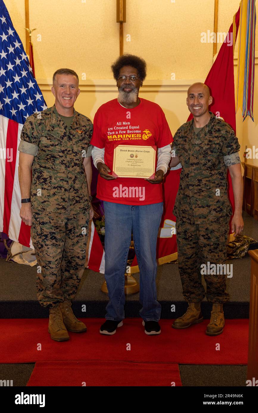 U.S. Marine Corps Brig. Gen. Jason G. Woodworth, left, the commanding ...