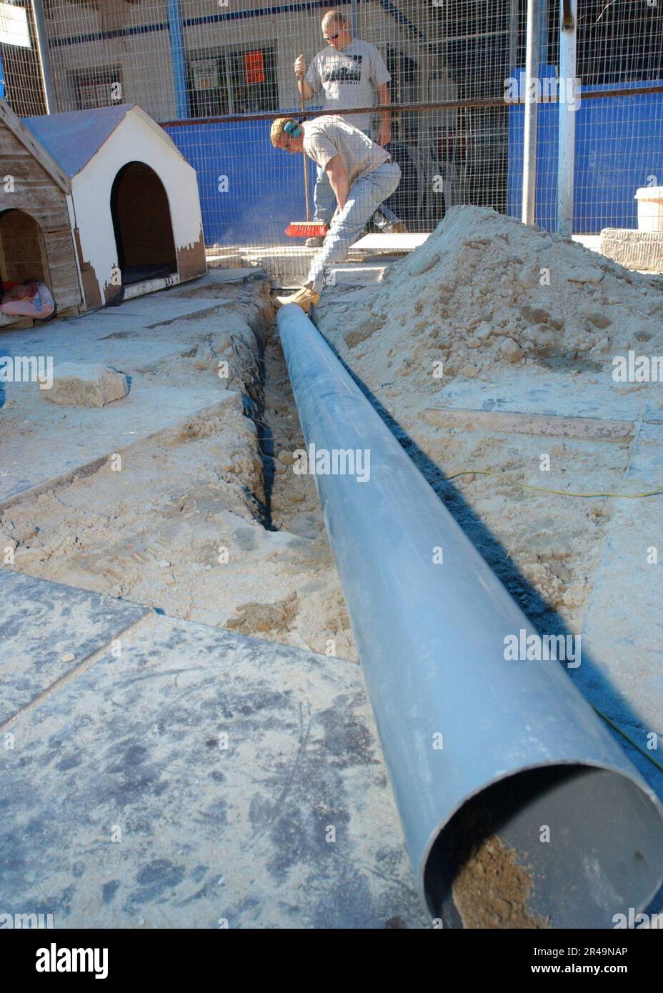 US Navy Construction Electrician assigned to Naval Mobile Construction ...