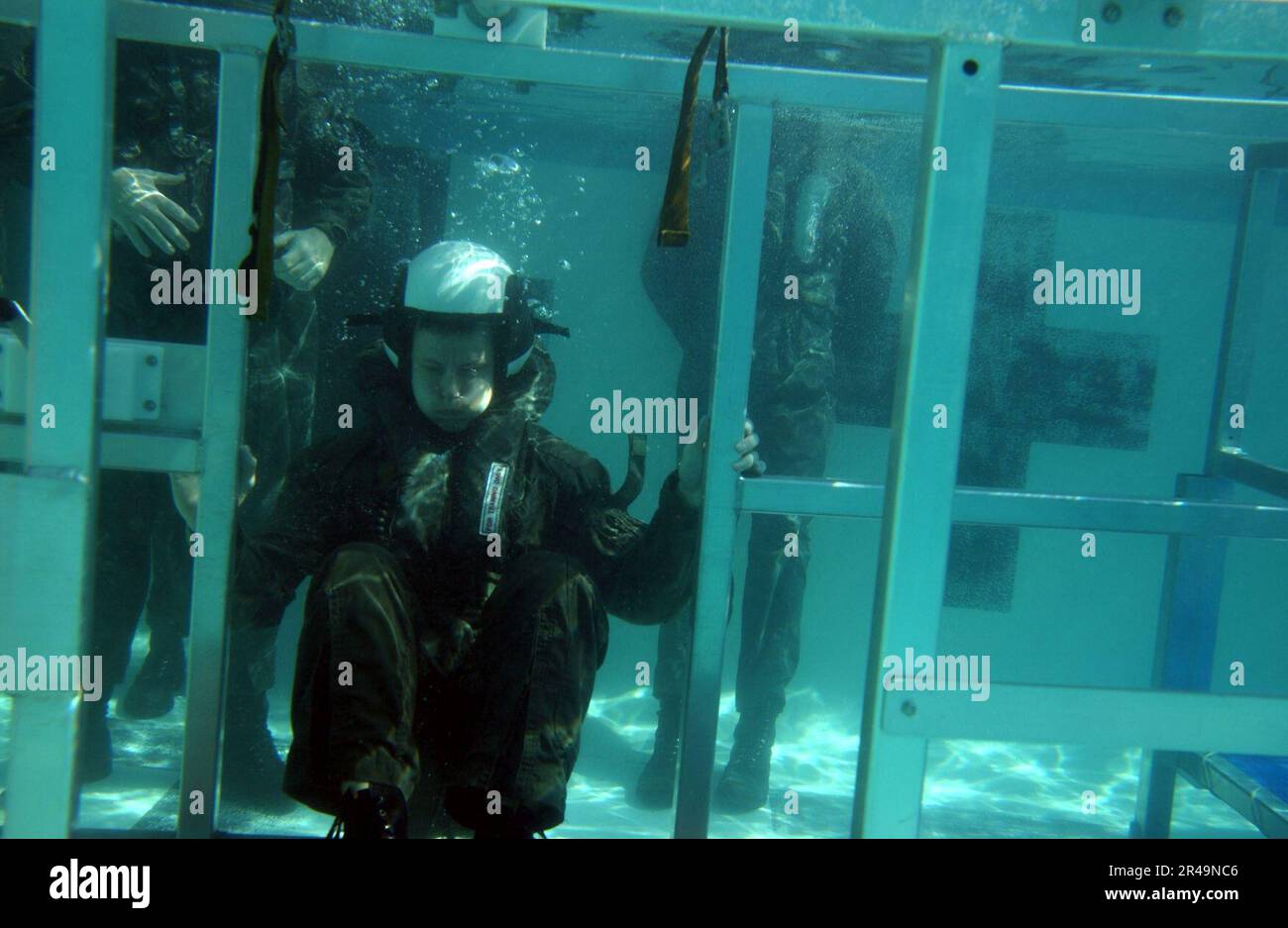 US Navy A student participating in the Aviation Water Survival Course ...