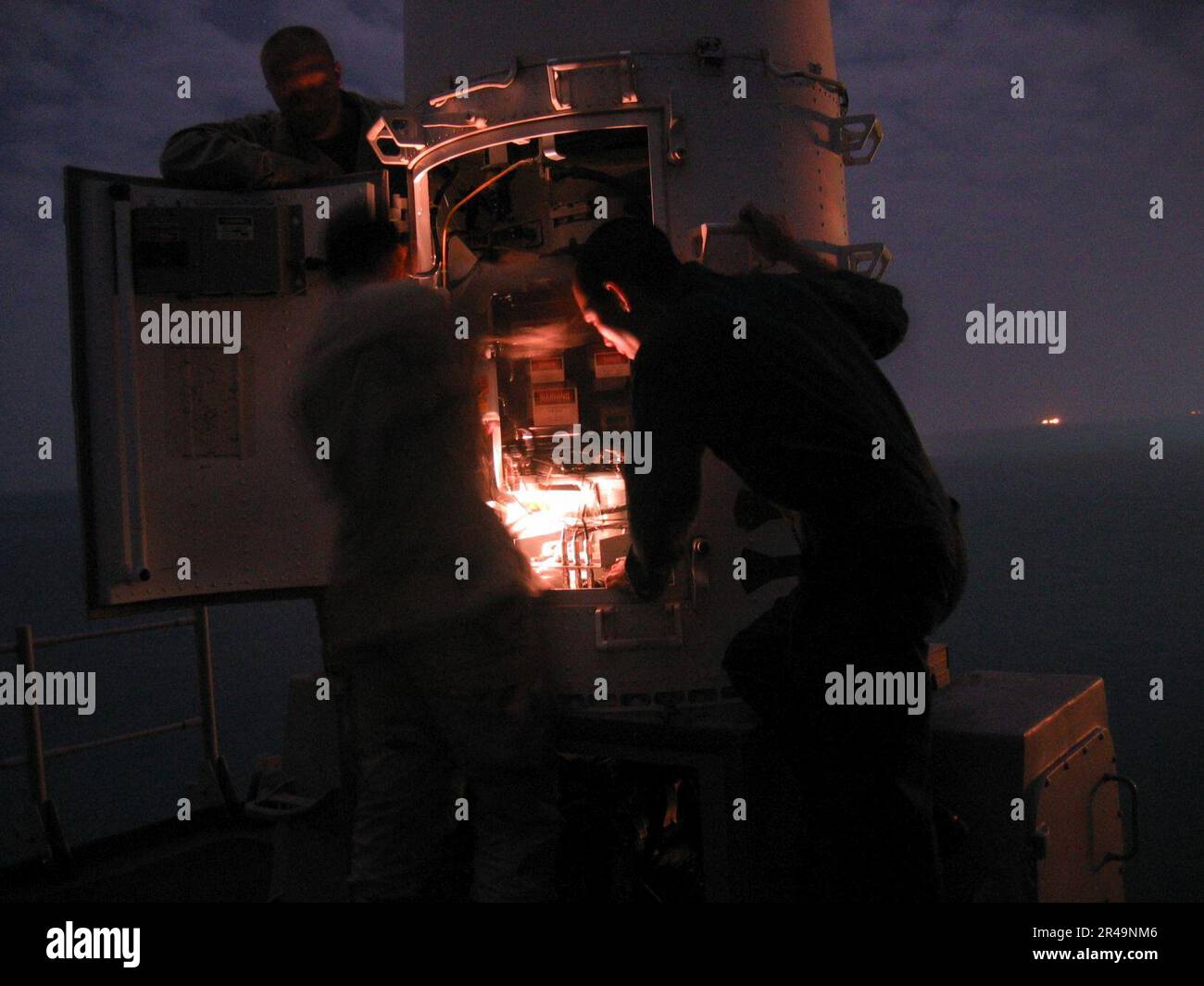 US Navy Fire controlmen stationed aboard the guided-missile destroyer ...