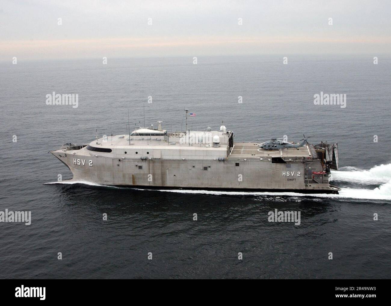 US Navy High Speed Vessel Two (HSV 2) Swift glides through the waters ...