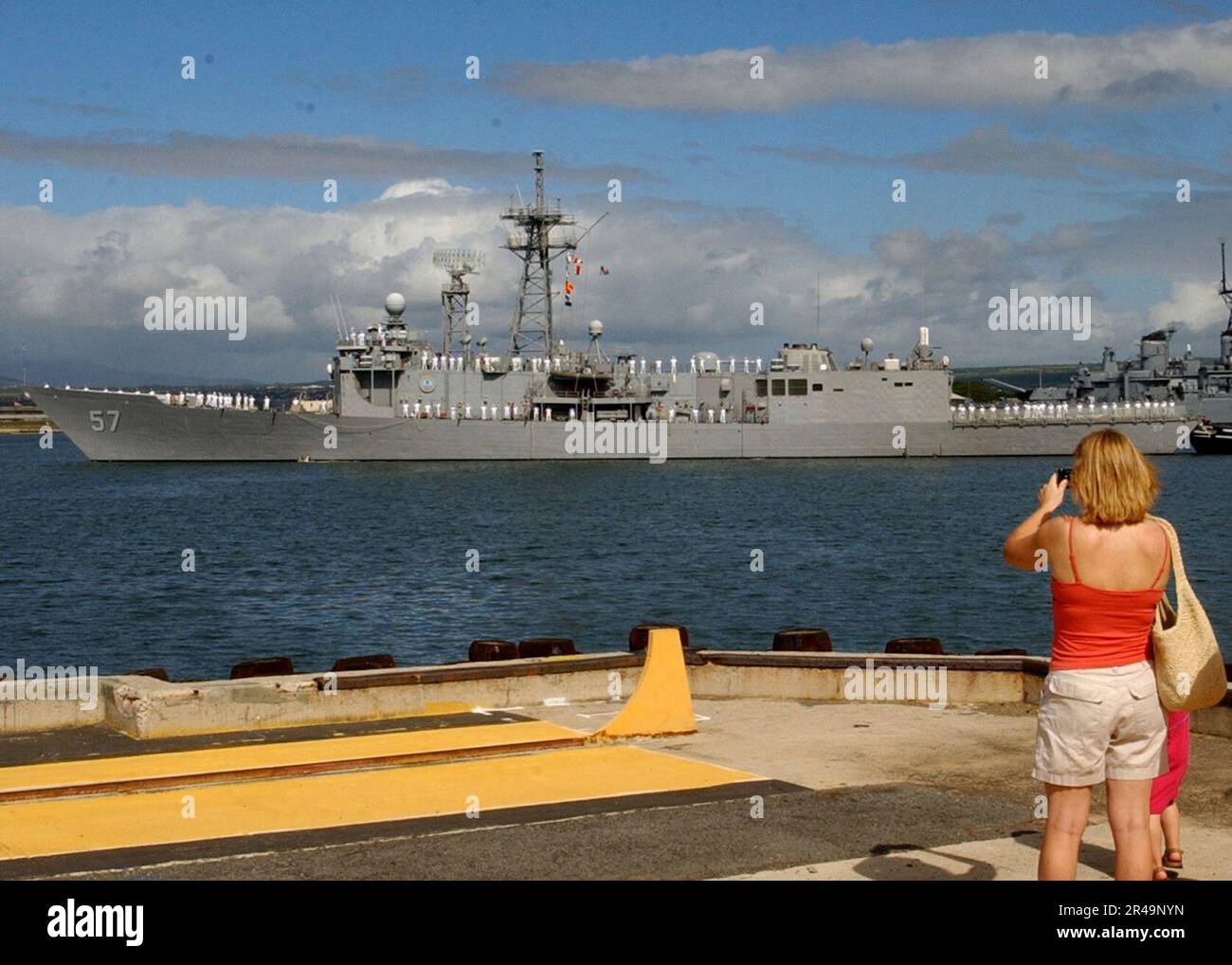 US Navy Family members of Sailors assigned to the guided missile ...