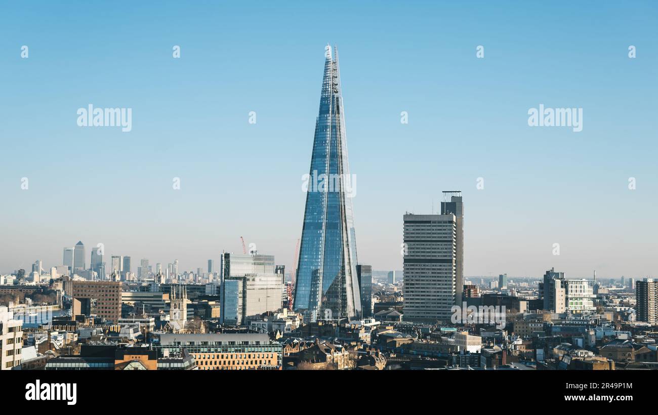 An aerial view of a cityscape with tall buildings and the Shard in ...