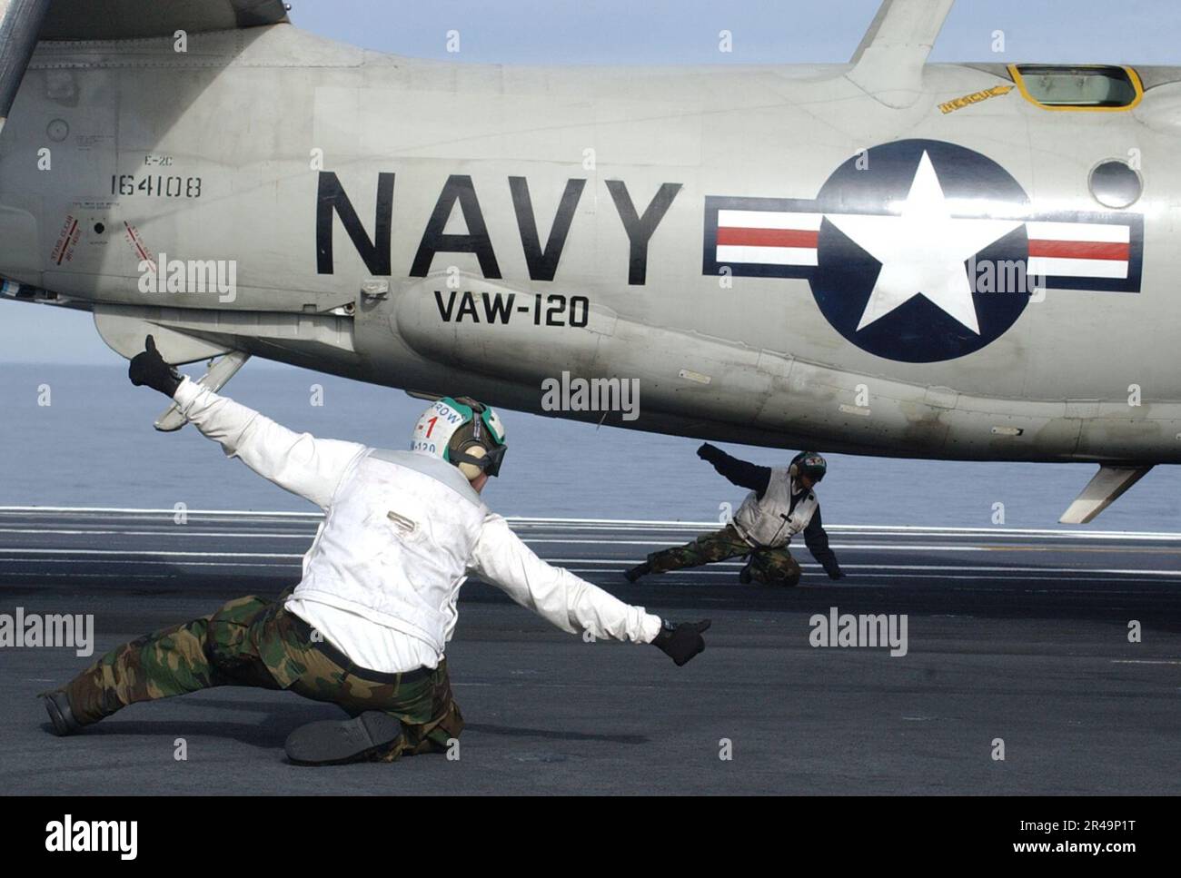 US Navy Final Checker flight deck personal give final clearance to ...