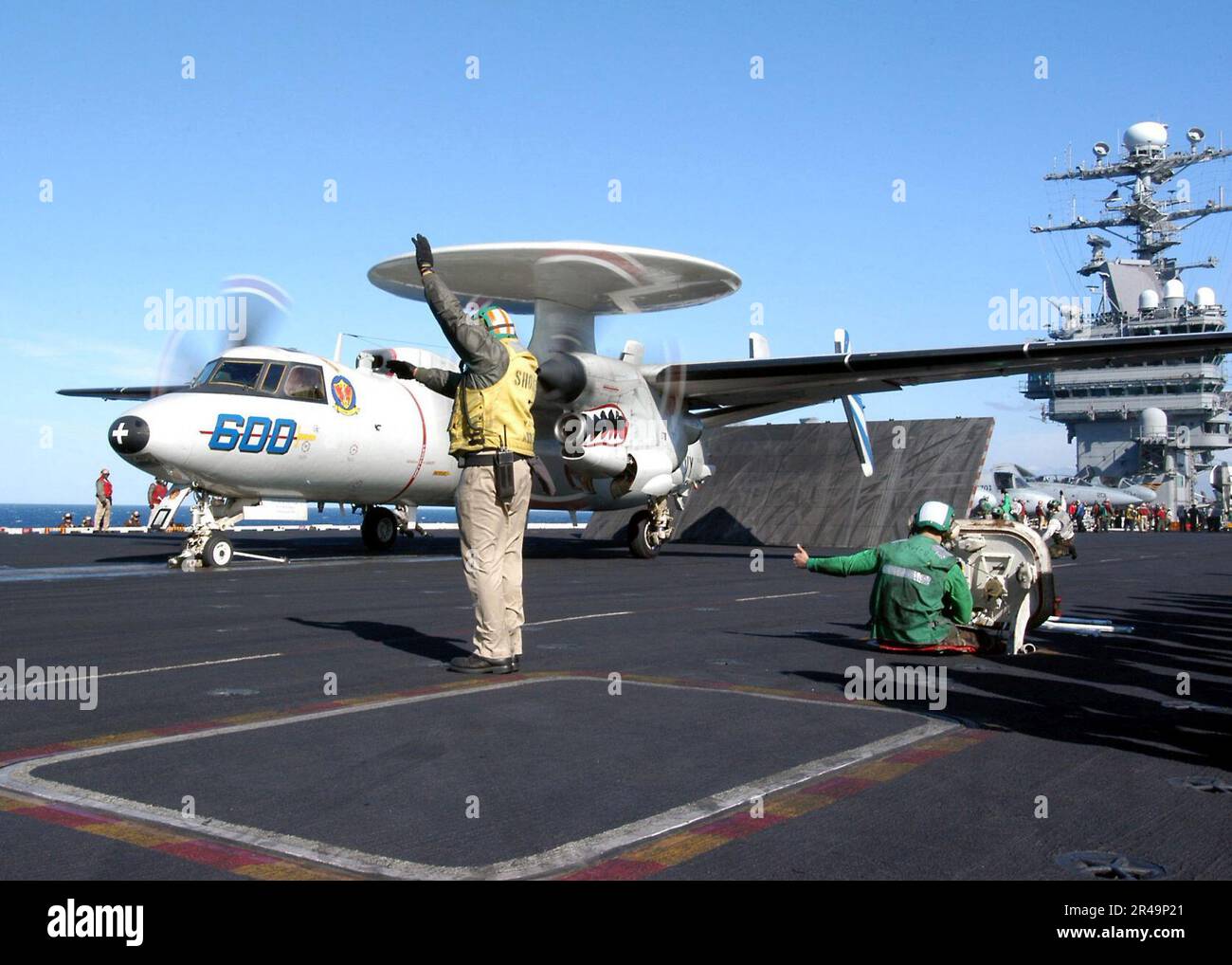 US Navy prepares an E-2C Hawkeye assigned to the Bluetails of Carrier ...