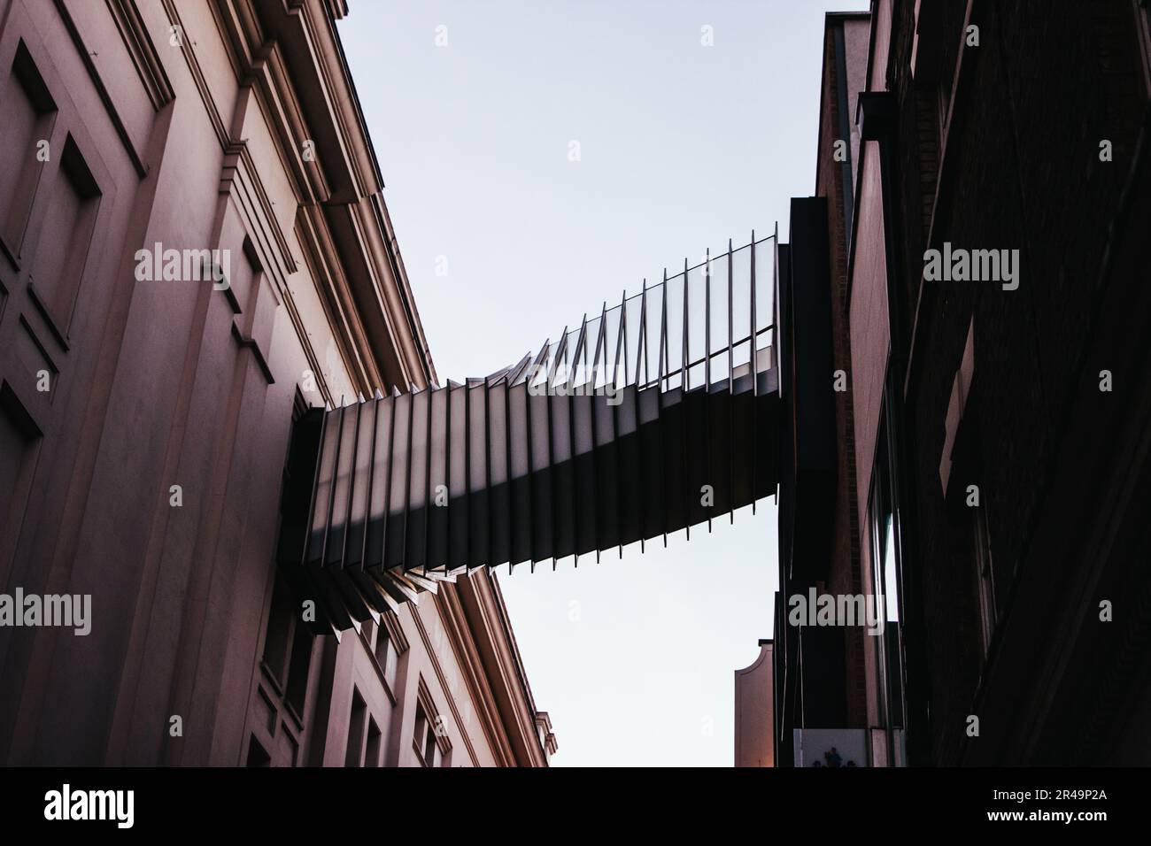 A low angle shot of a bridge connecting buildings of the Royal Opera ...