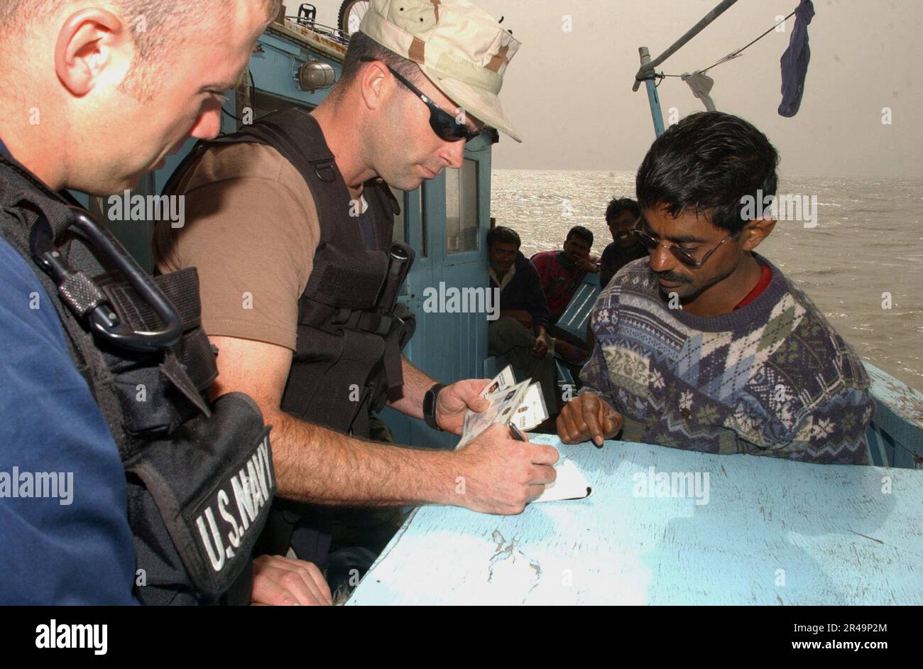 US Navy The Visit, Board, Search, and Seizure (VBSS) team assigned to ...