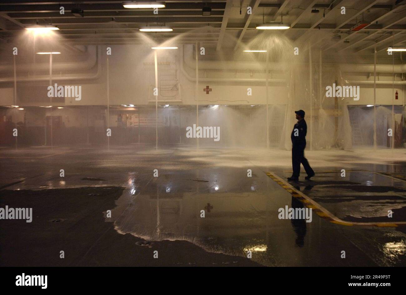 US Navy Master observes Aqueous Film Forming Foam (AFFF) sprinkler ...