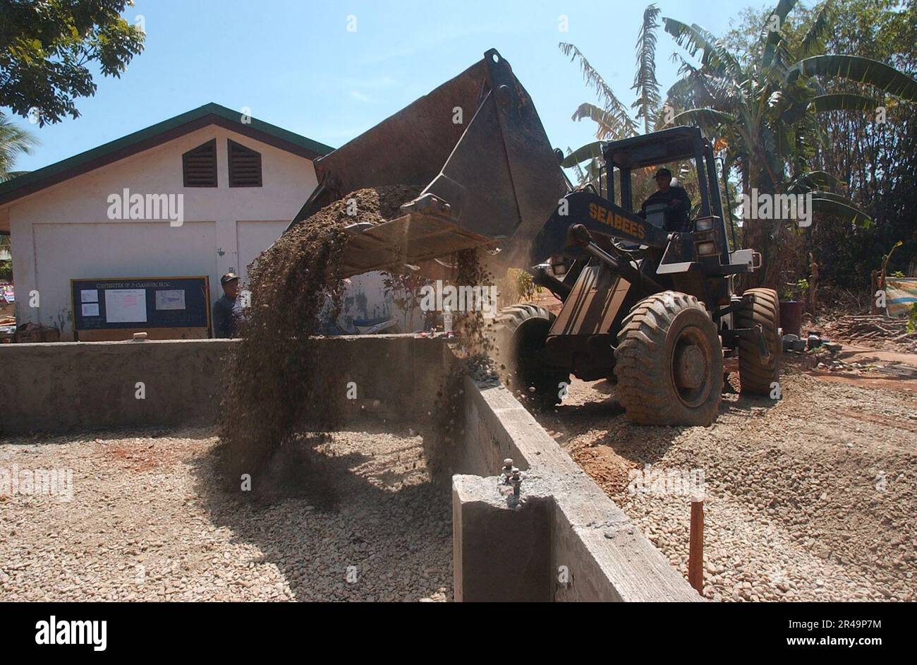 US Navy A front loader assigned to the ''Club and Spades'' of Naval ...