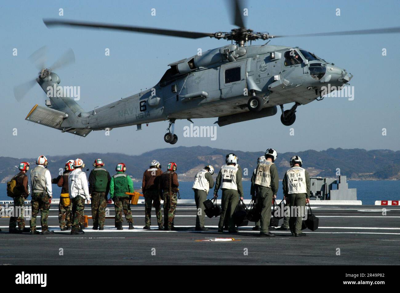 US Navy An HH-60H Seahawk lands on the flight deck of the aircraft carrier USS Kitty Hawk (CV 63 ...