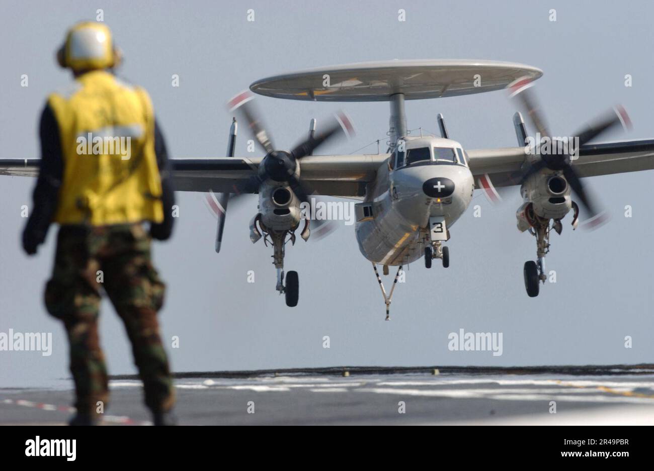 US Navy An E-2C Hawkeye makes an arrested landing aboard the aircraft ...
