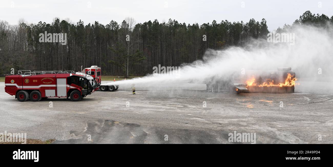 Arnold Air Force Base Fire and Emergency Services personnel spray water ...