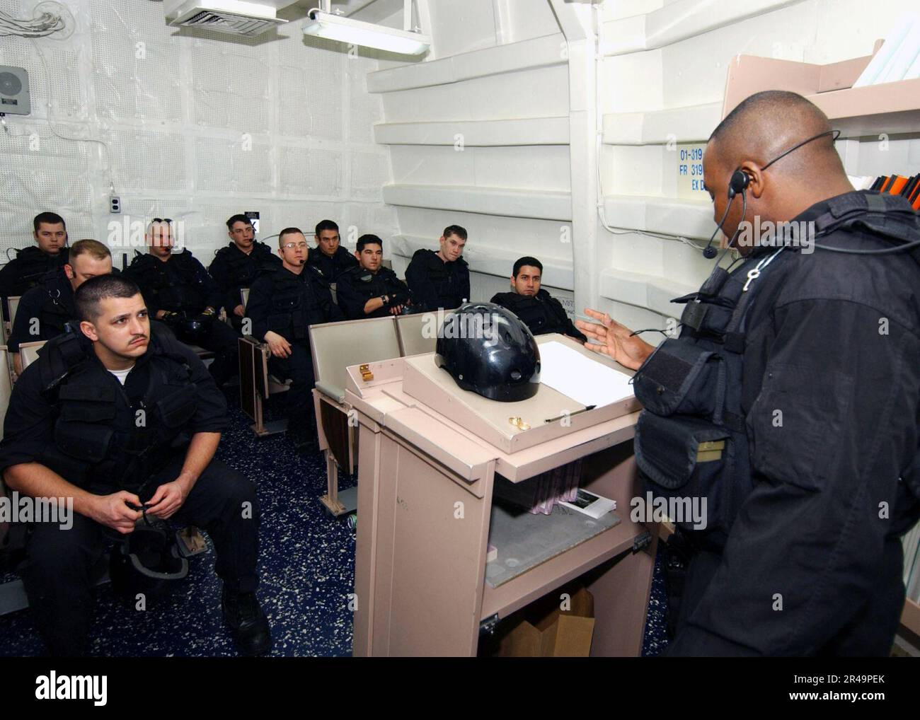 US Navy Members of the Vessel, Board, Search, and Seizure (VBSS) team ...
