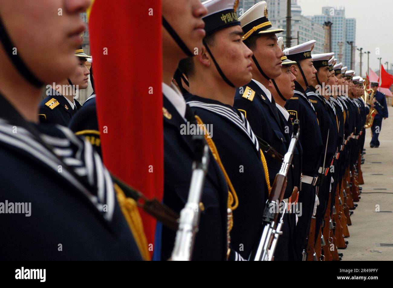 US Navy People's Liberation Army (Navy) sailors stand in formation on ...