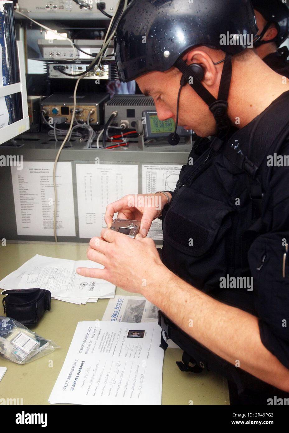 US Navy A member of the Vessel, Board, Search, and Seizure (VBSS) team ...