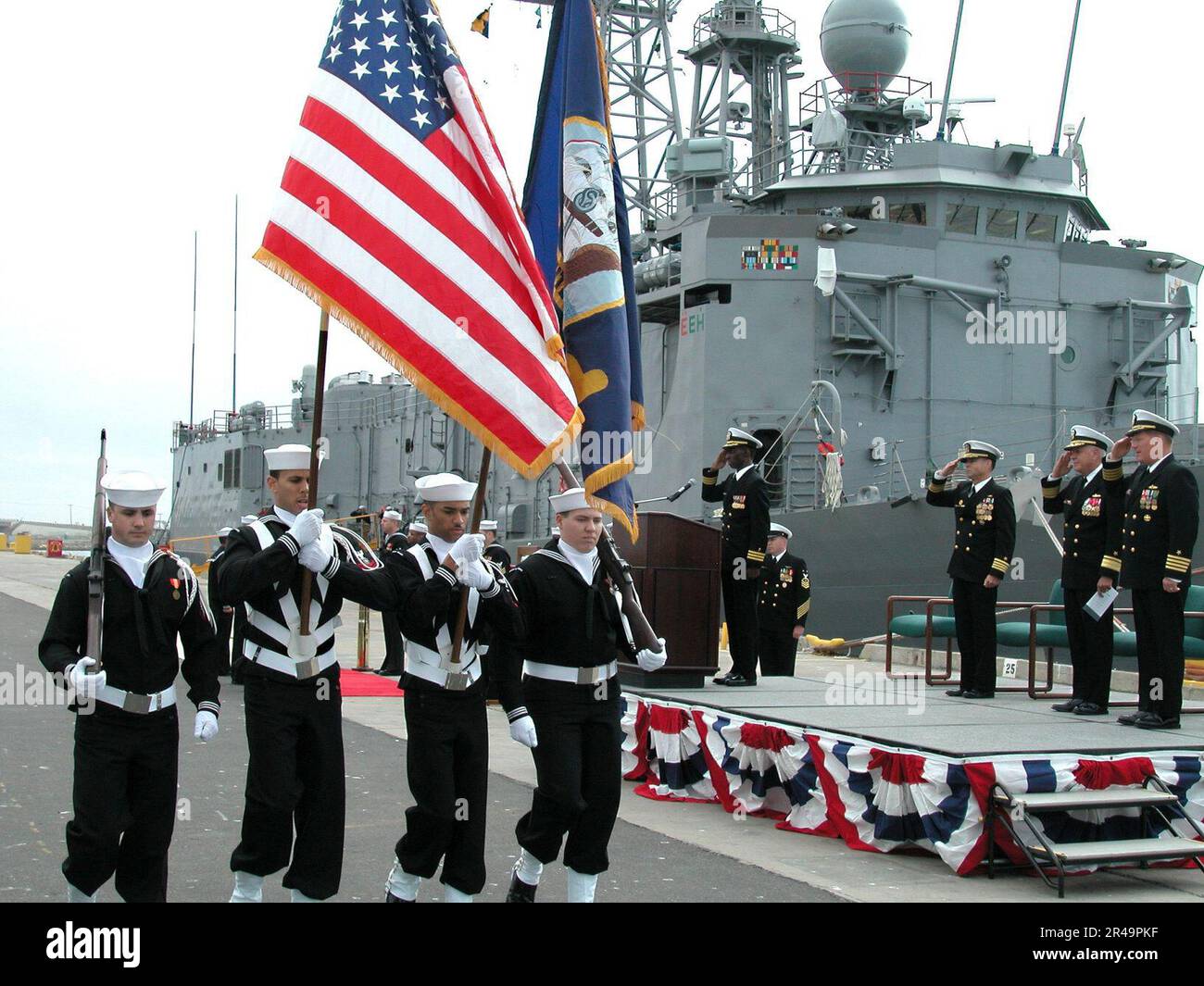 US Navy The color guard parades the colors during a change of command ceremony on the explosives ...