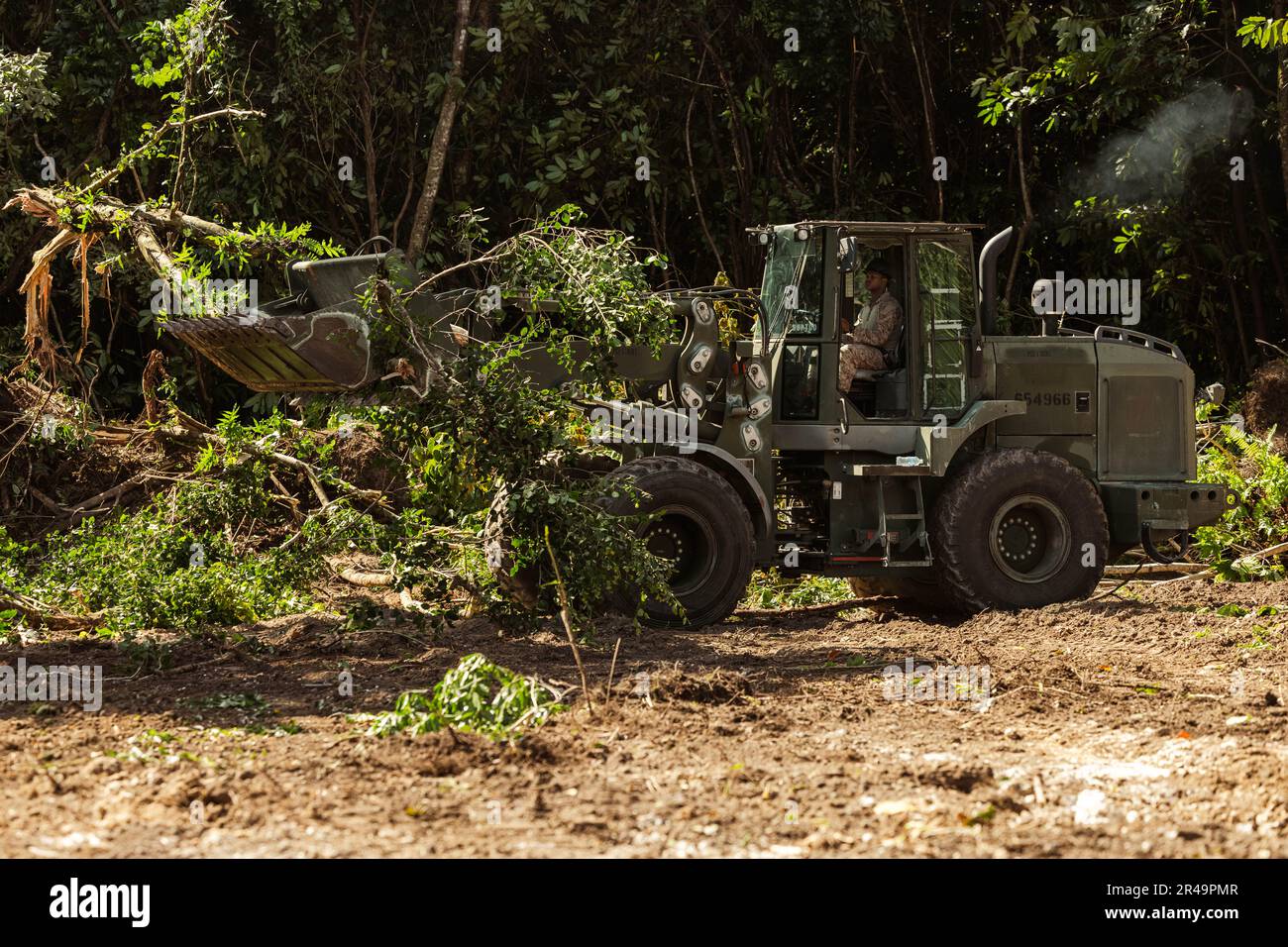 U.S. Marine Corps Lance Cpl. Joshua Collins, an engineer equipment ...