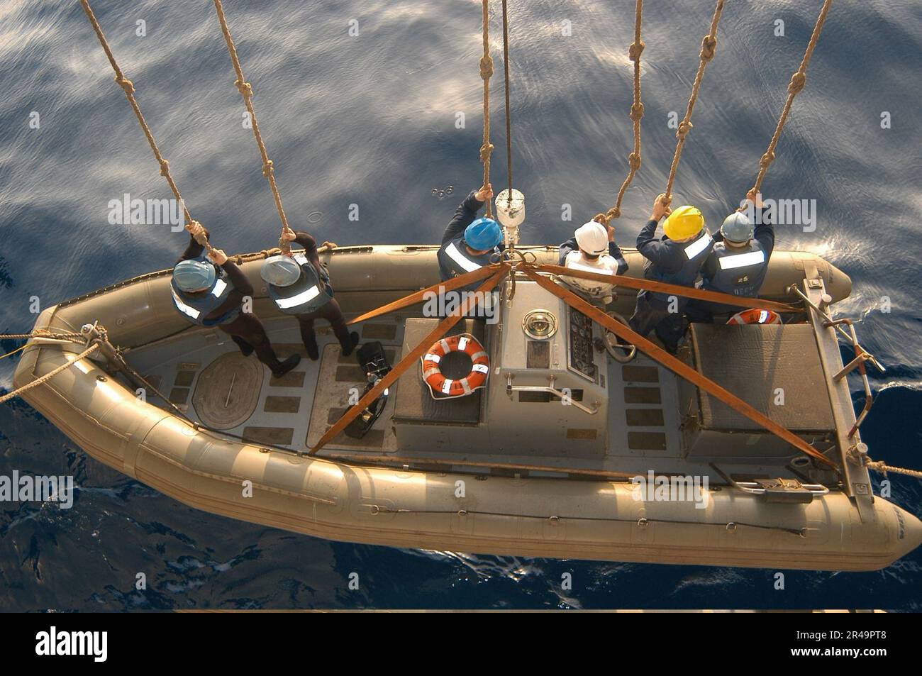 US Navy USS Kitty Hawk's (CV 63) deck department lowers a Rigid Hull ...