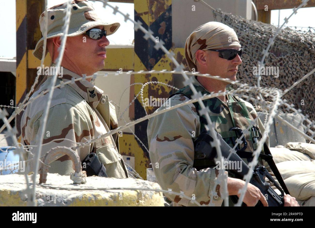 US Navy Culinary Specialist 1st Class left, and Boatswain's Mate 3rd ...