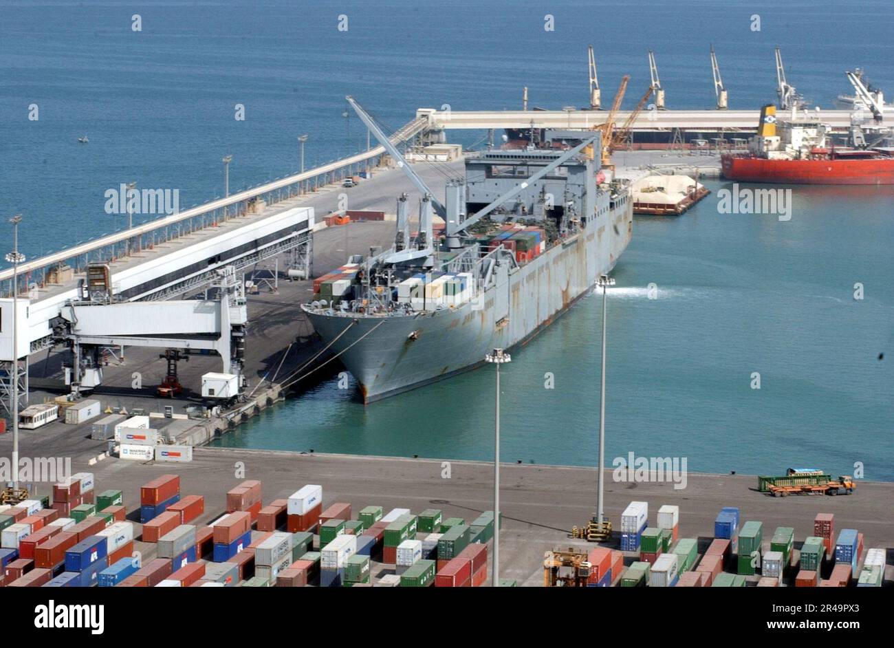 US Navy A Military Sealift Command (MSC) ship sits tied-up to the pier ...
