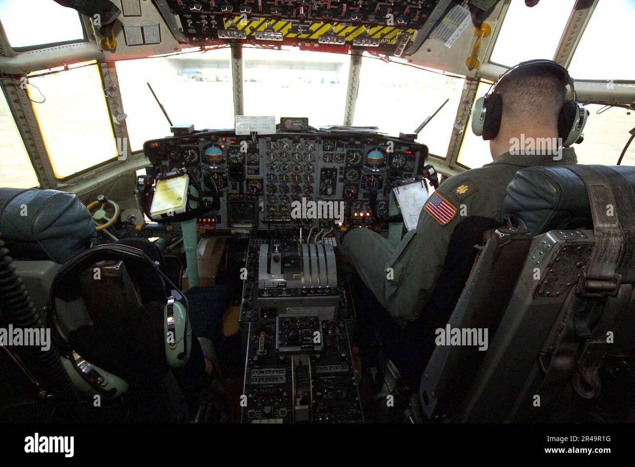 US Navy U.S. Navy Pilot goes through a pre-flight checklist before a ...