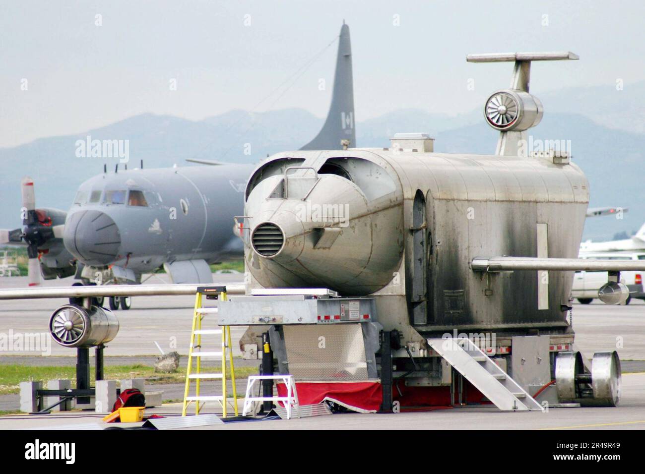 US Navy A Mobile Aircraft Fire Trainer (MAFT) sits on flight line on ...