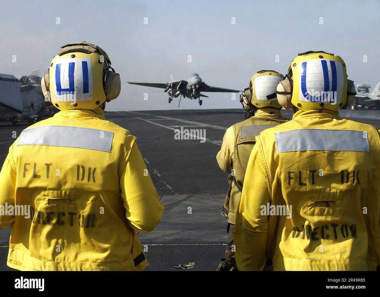 US Navy Flight deck directors receive instruction on flight deck ...