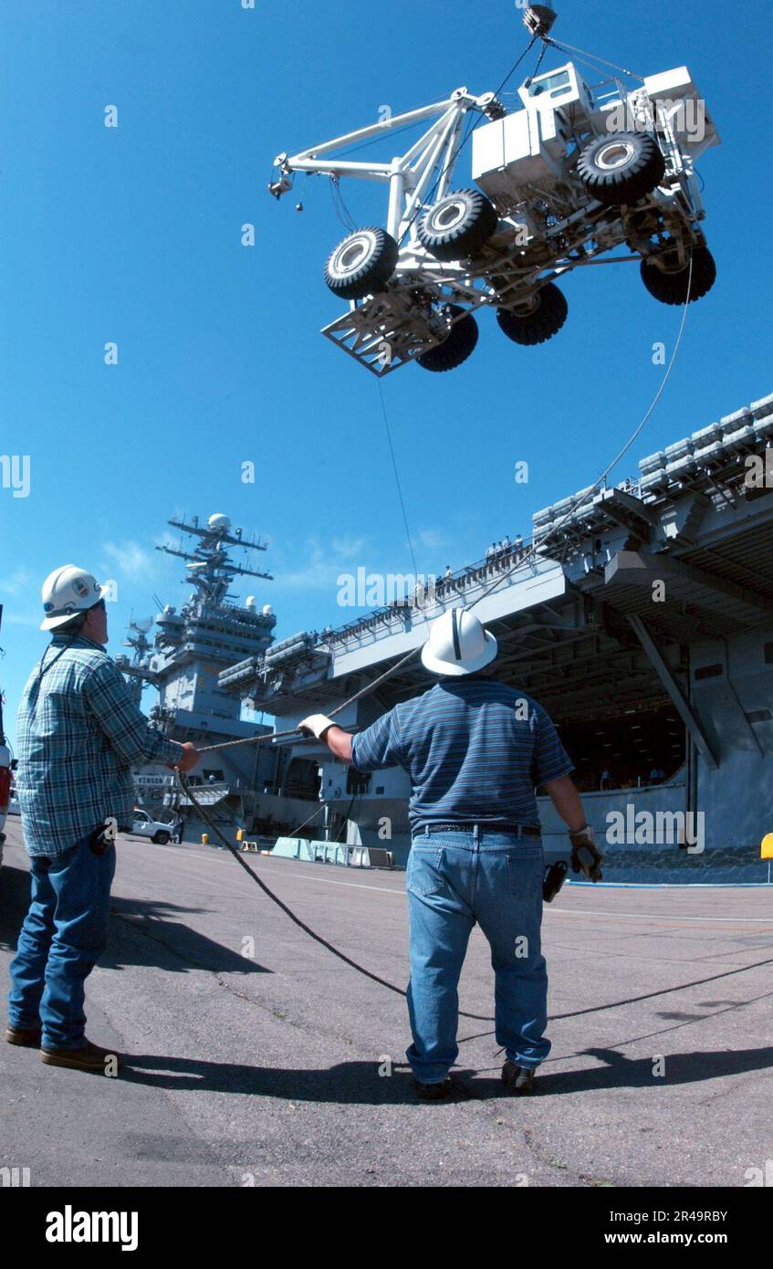 US Navy The flight deck crash and salvage crane aboard the aircraft ...