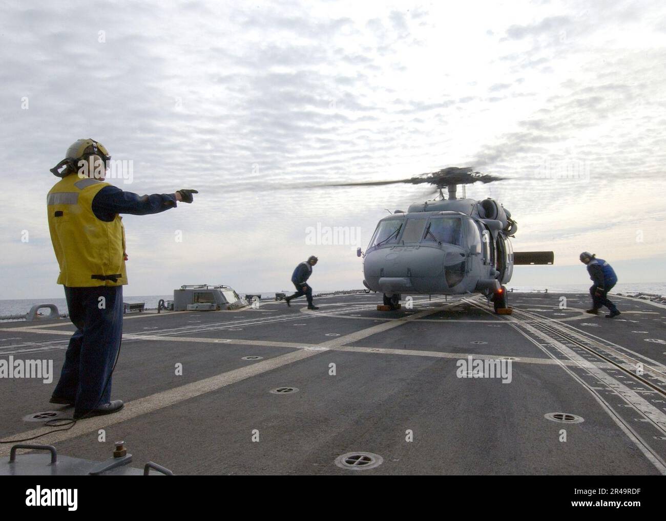 US Navy An MH-60S Knighthawk assigned to the Dragon Whales of ...
