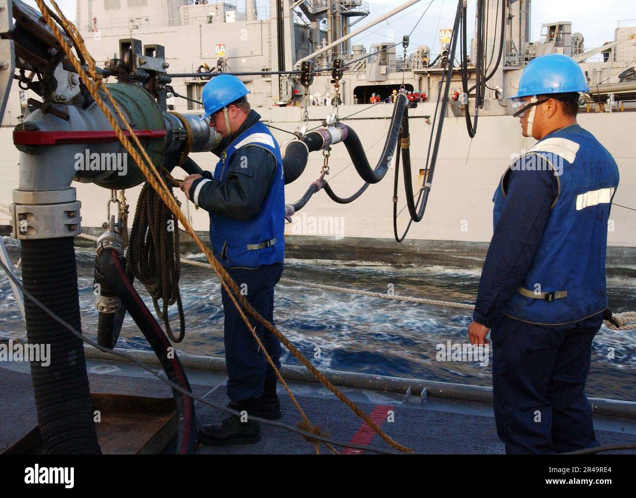 US Navy Sailors assigned to the guided missile frigate USS Taylor (FFG ...