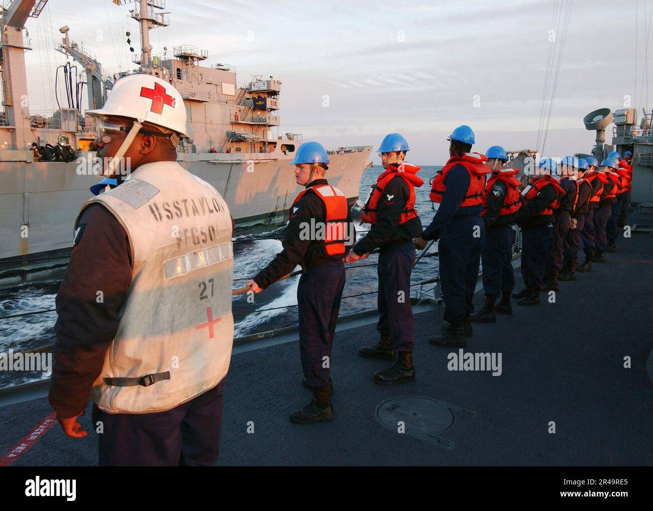 US Navy Sailors assigned to the guided missile frigate USS Taylor (FFG ...