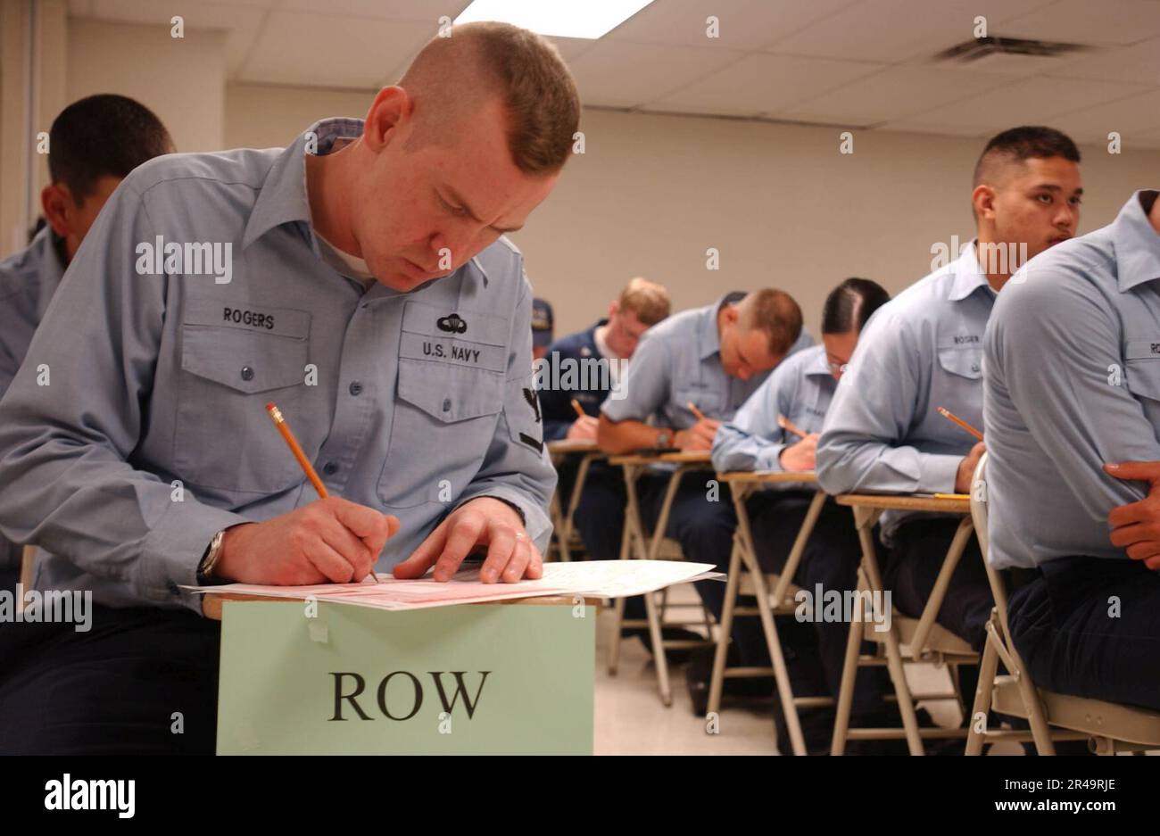 US Navy Sailors assigned to USS Nimitz (CVN 68) concentrate on taking ...