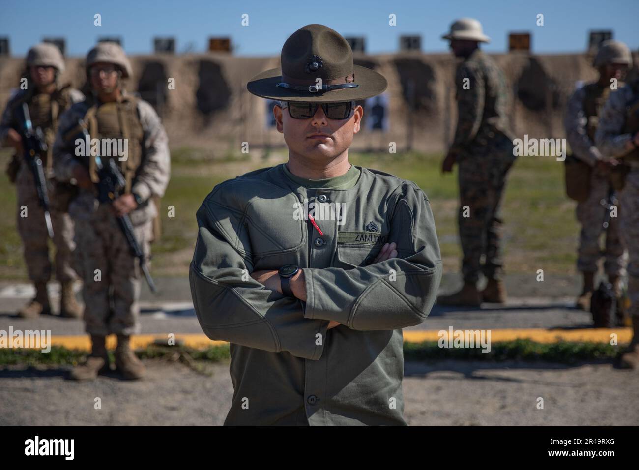 U.S. Marine Corps Sgt. Jesus Zamudio, a primary marksmanship instructor ...