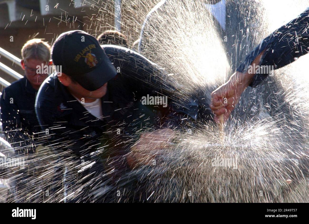 US Navy Sailors assigned to the guided missile cruiser USS Lake Erie ...