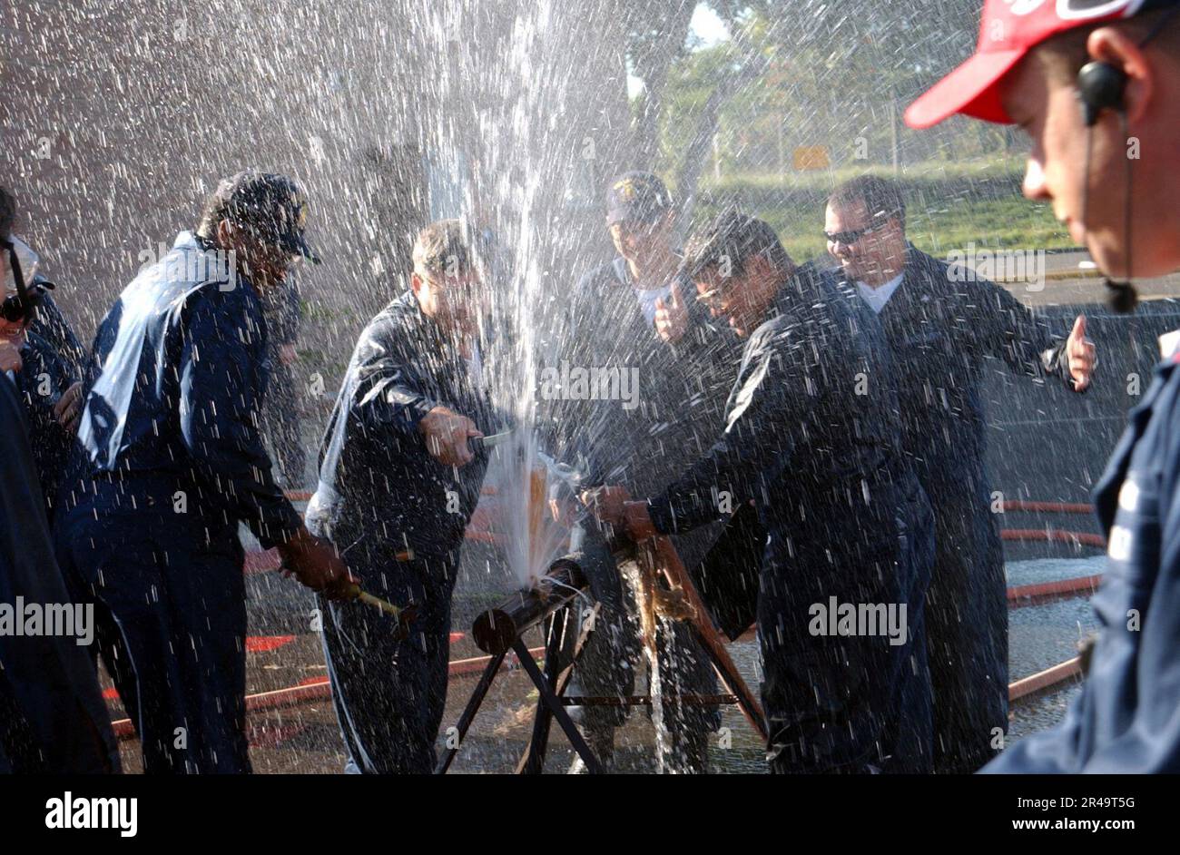 US Navy Sailors assigned to the guided missile cruiser USS Lake Erie ...