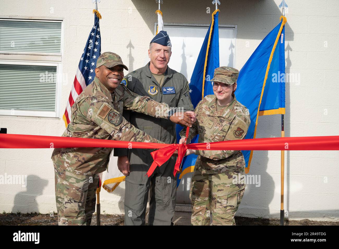 From left to right, Chief Master Sgt. Ronnie Woods, 18th Wing command ...