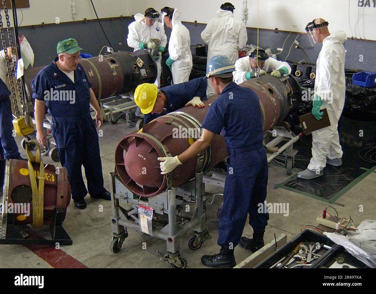 US Navy Mineman 1st Class acting as Safety Observer, watches as Mineman ...