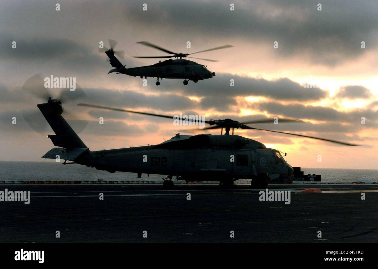 US Navy After an SH-60F Seahawk assigned to the Black Knights of ...