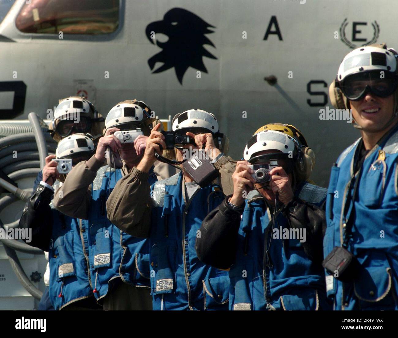 US Navy Distinguished Visitors photograph flight operations on the ...