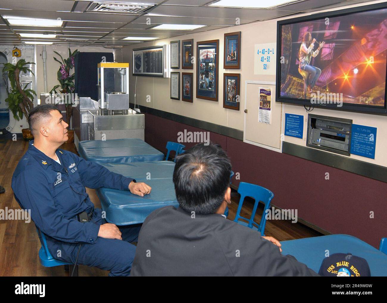US Navy Machinist's Mate 1st Class and a shipmate watch Velasco's ...
