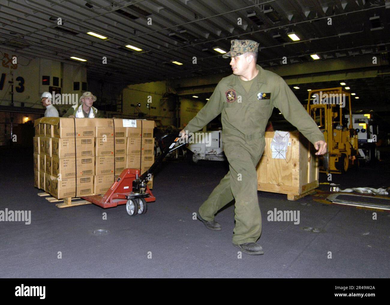 US Navy U.S. Marines assigned to the amphibious assault ship USS Wasp ...