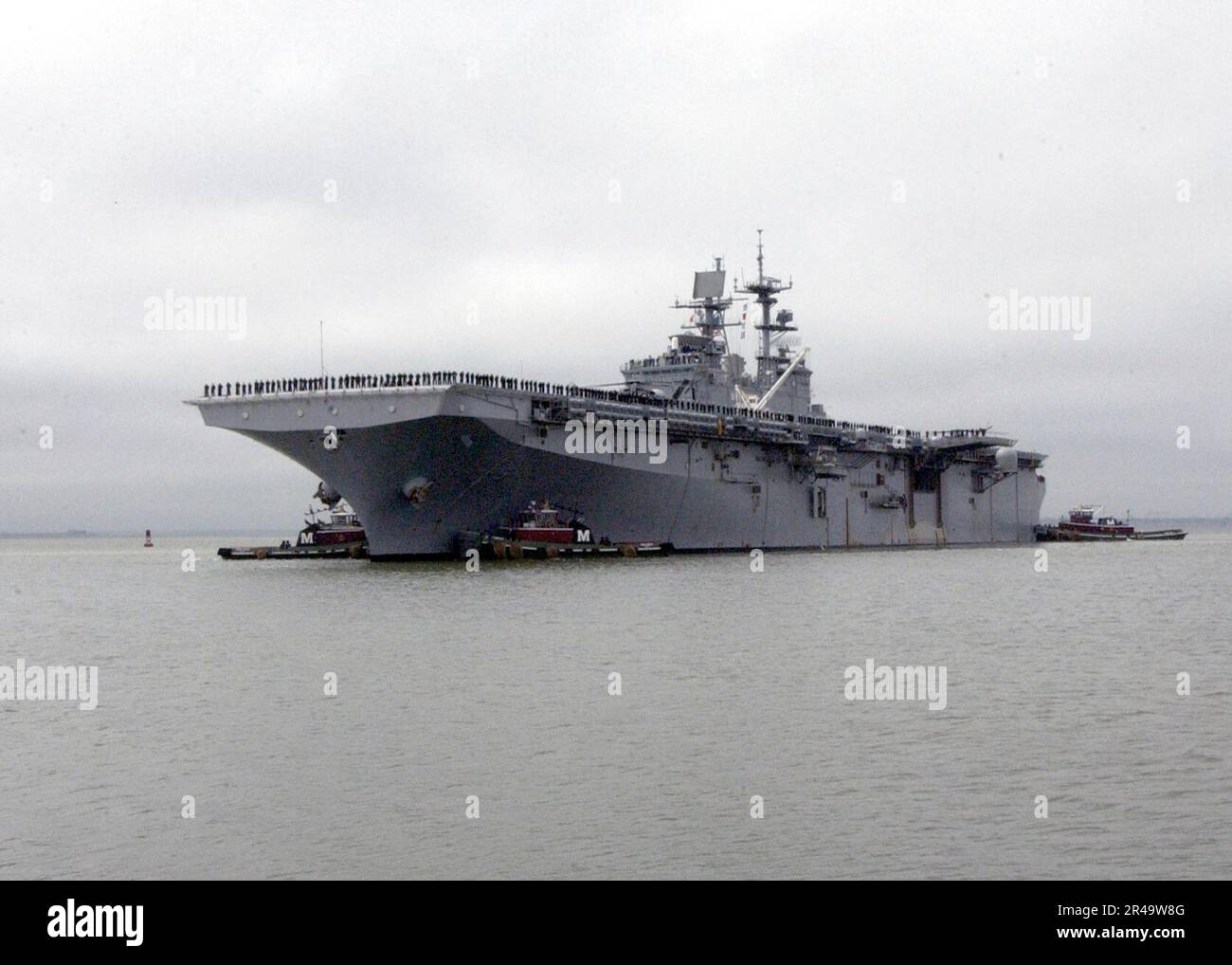 US Navy The amphibious assault ship USS Bataan (LHD 5) returns to its ...