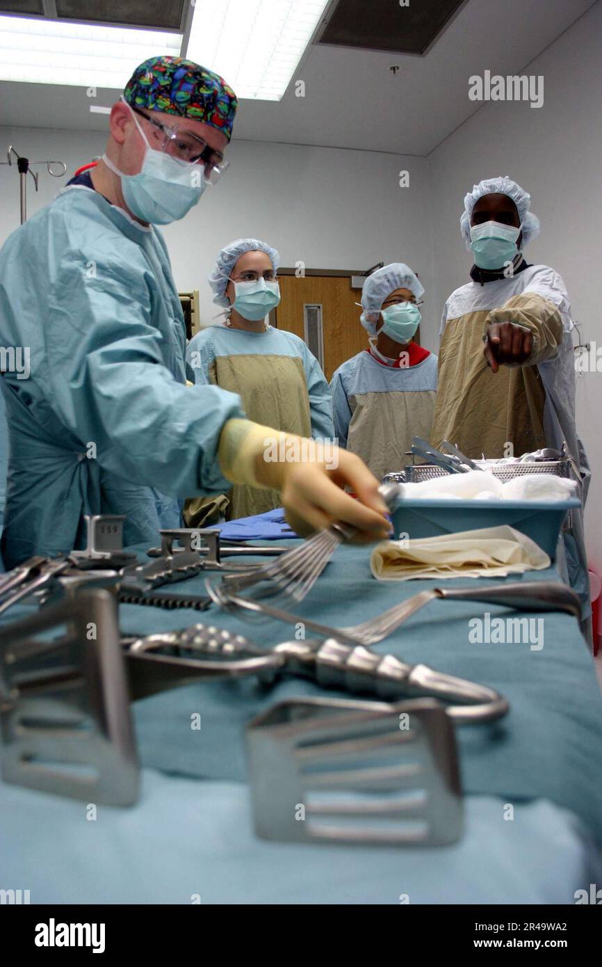 US Navy Hospitalman shows eighth-grade students from Naval Air Station ...