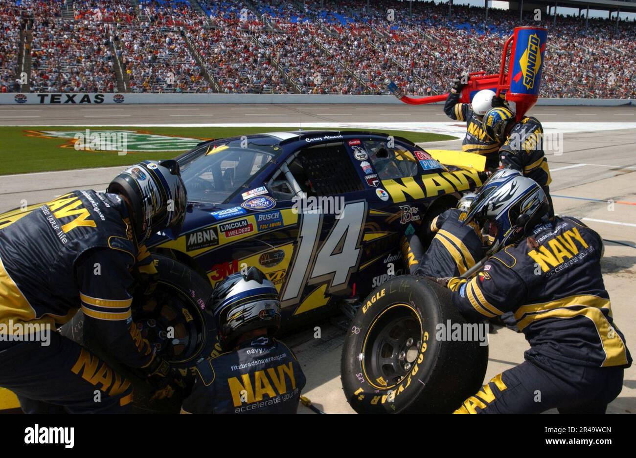 US Navy The Navy sponsored Fitz-Bradshaw pit crew performs a flawless ...