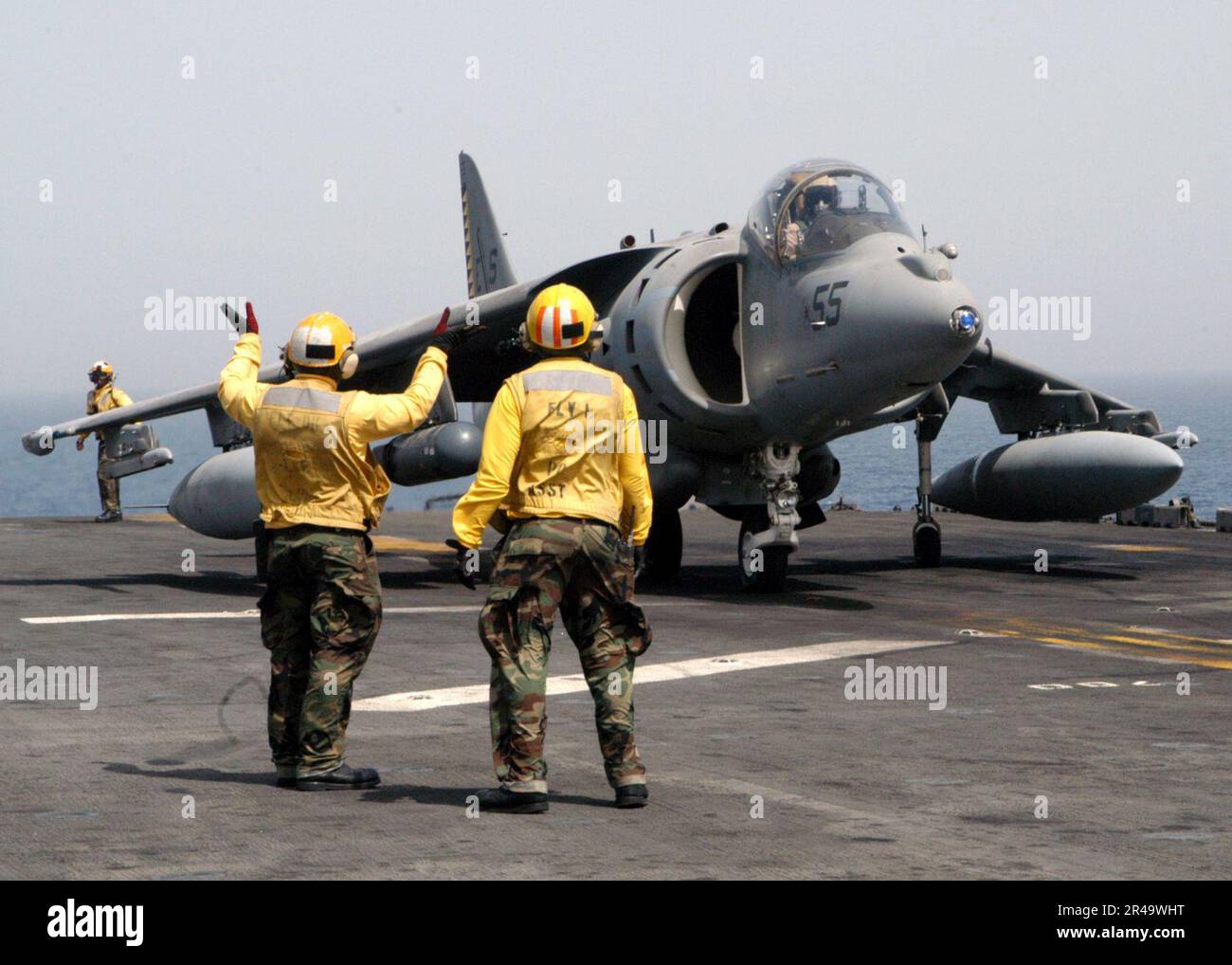 US Navy A plane director assigned to the amphibious assault ship USS ...