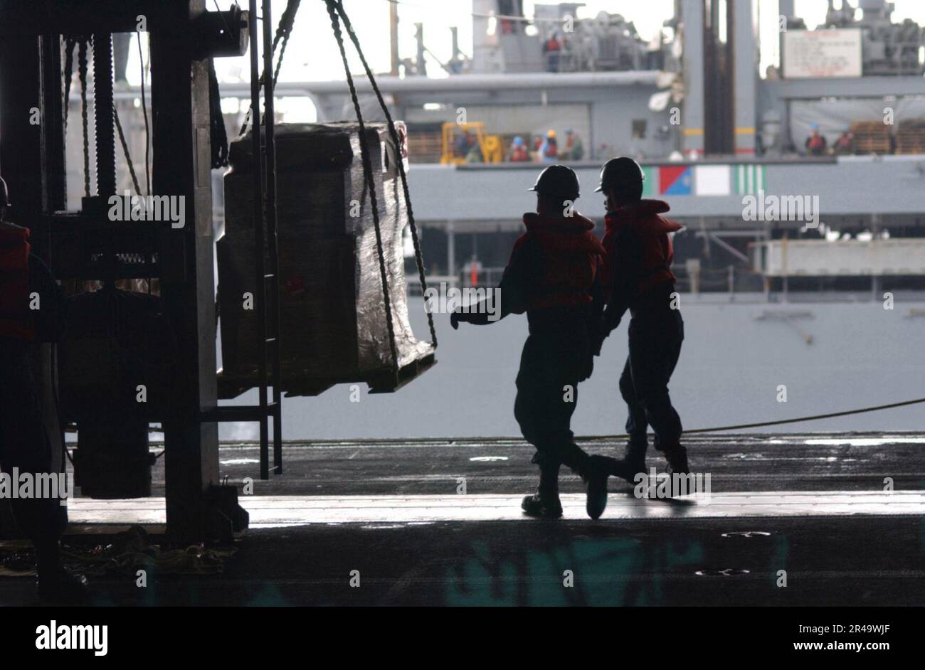 US Navy Sailors aboard the nuclear powered aircraft carrier USS Harry S ...